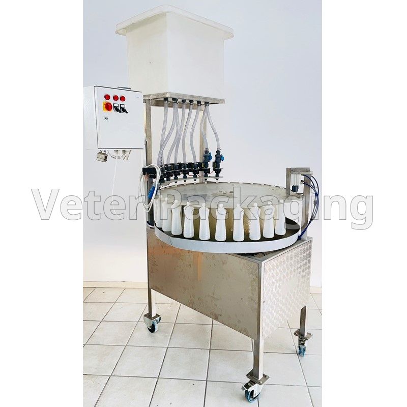 Automatic rotary monoblock filling and capping machine for packaging ...